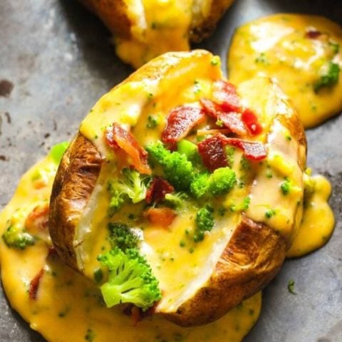 Loaded Baked Potatoes with Homemade Cheese Sauce