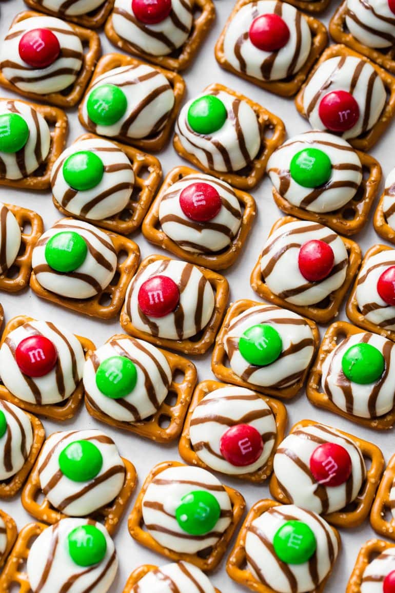 Addicting Christmas M&M Pretzel Hugs - Oh Sweet Basil